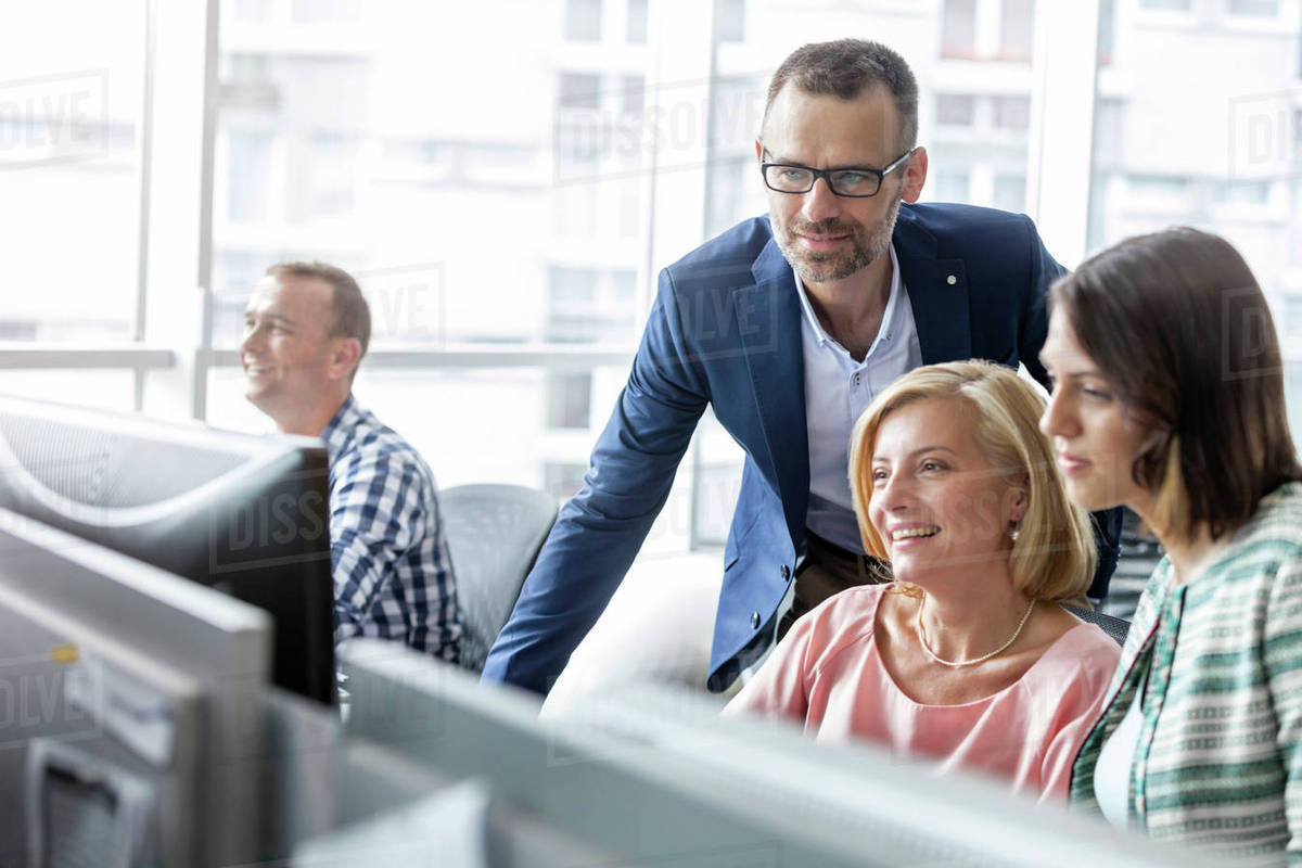 Business people working at computer in office - Royalty-free Stock ...