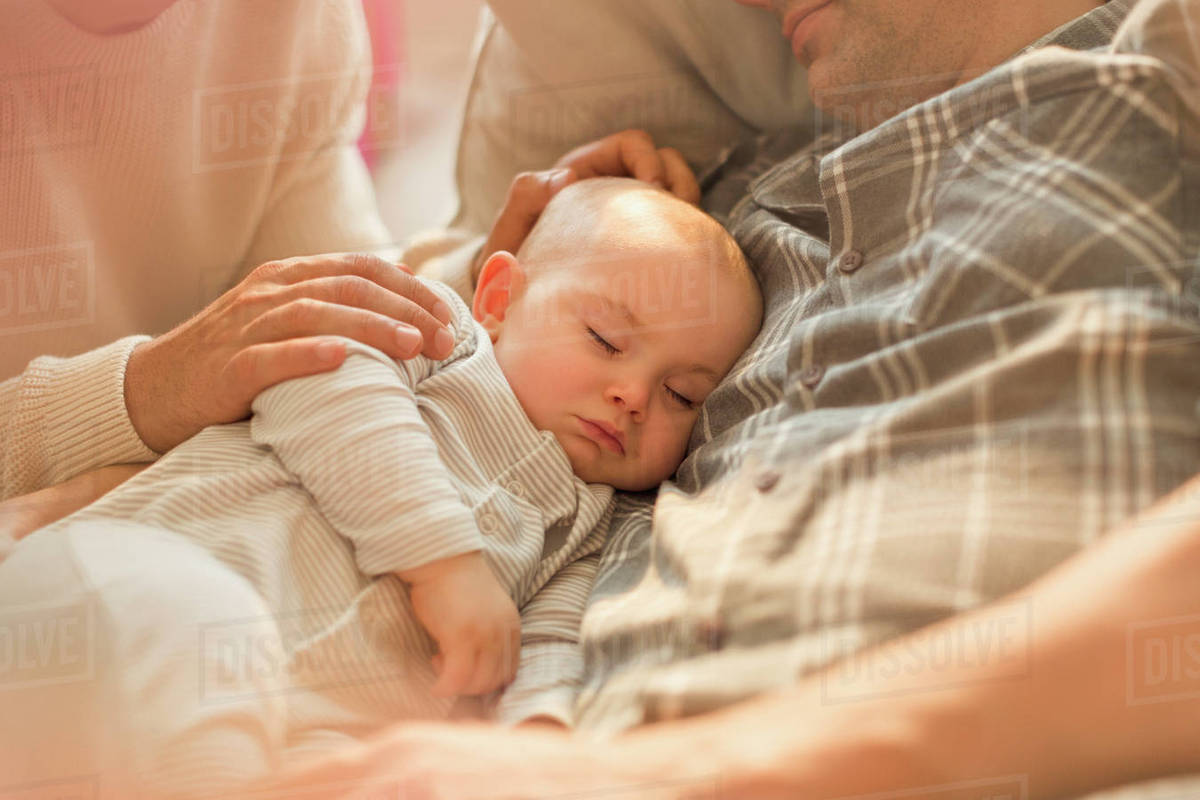 Tired sleeping baby son napping with father - Royalty-free Stock Photo ...