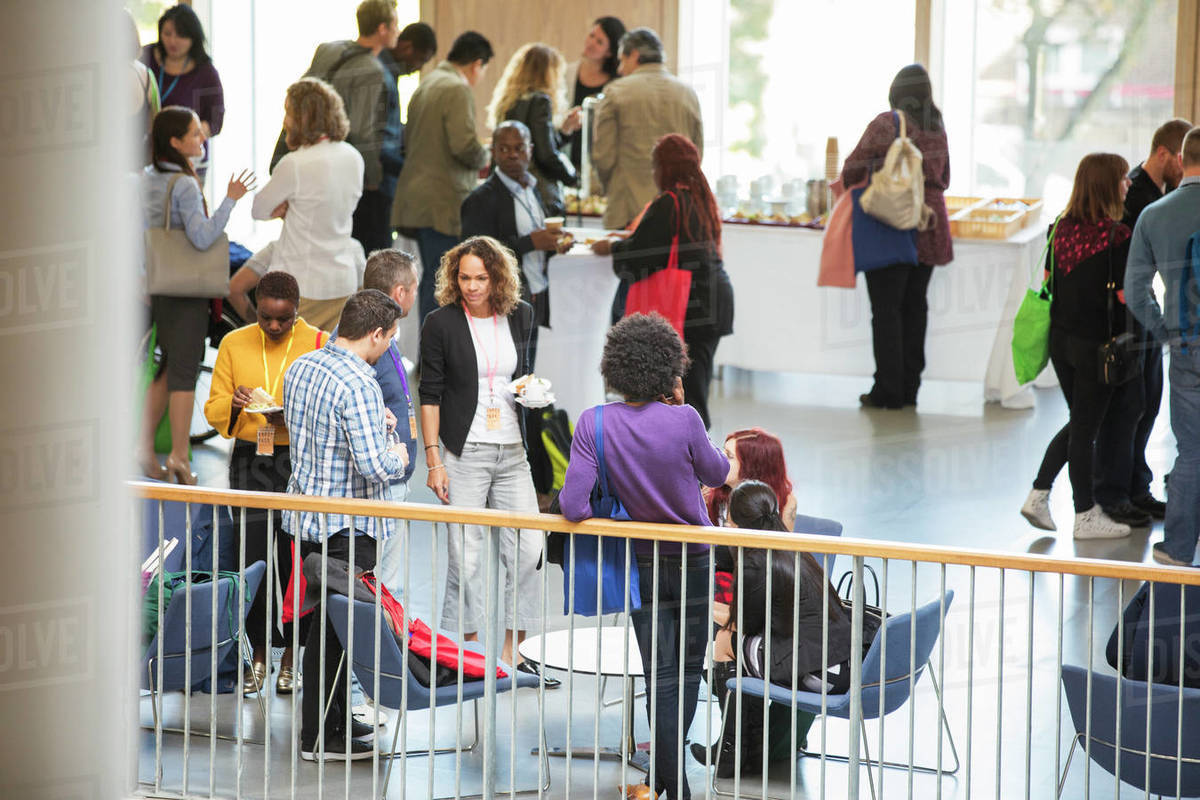 Business people networking, talking at conference - Royalty-free Stock ...