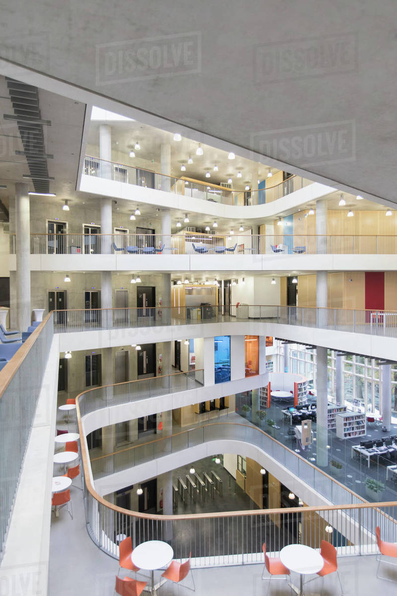 Modern office atrium with balconies - Royalty-free Stock Photo | Dissolve