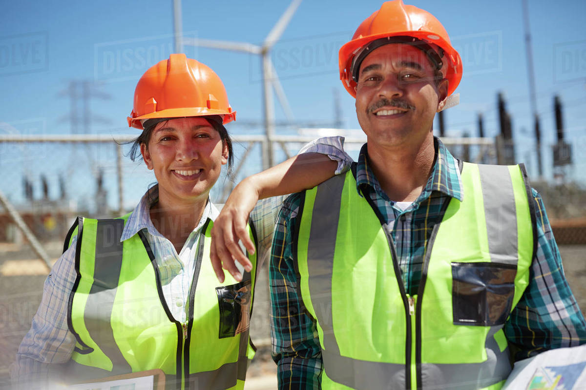 Portrait confident, smiling engineers at power plant - Stock Photo ...