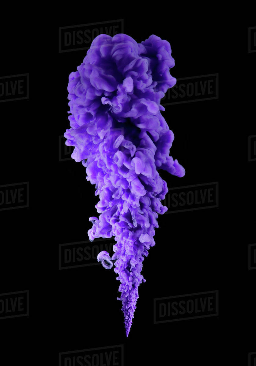 Purple ink on black background - Stock Photo - Dissolve