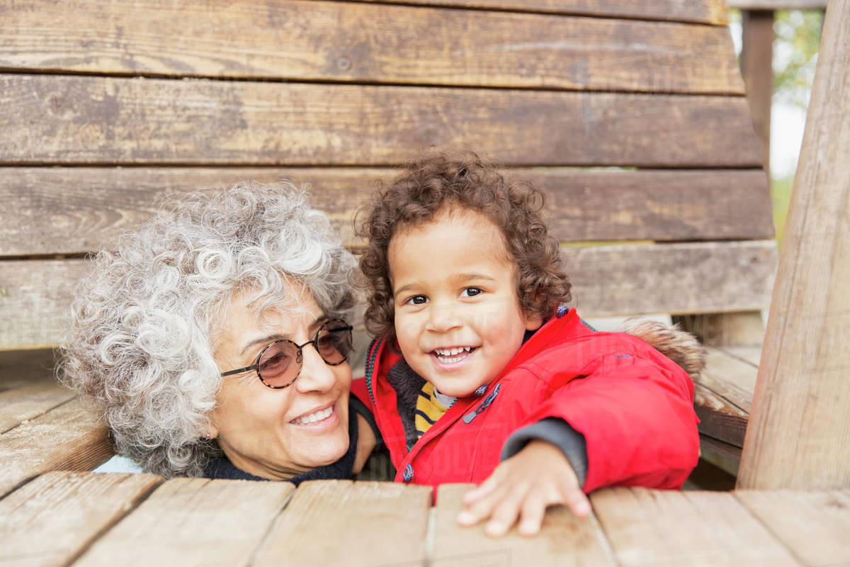 Portrait Playful Grandmother And Toddler Grandson Stock Photo Dissolve portrait-playful-grandmother-and-toddler-grandson-stock-photo-dissolve
