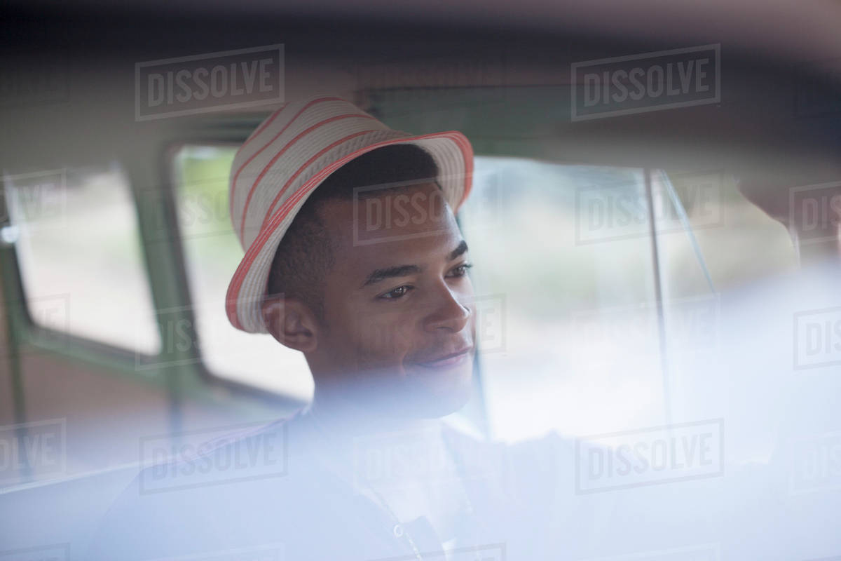 Smiling man driving van - Royalty-free Stock Photo | Dissolve