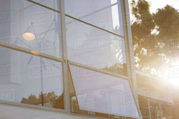 Open window of modern house - Stock Photo - Dissolve