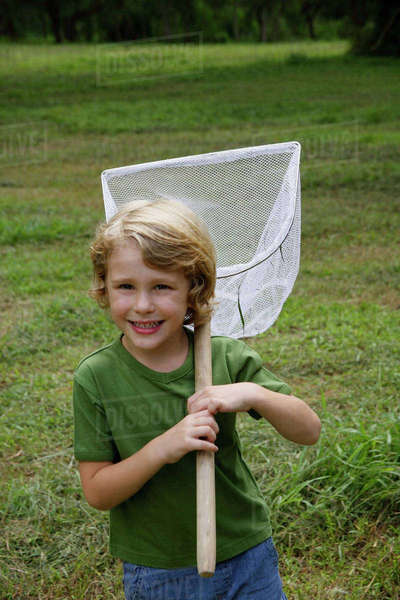 Little boy holding butterfly net, outside. - Royalty-free Stock Photo ...