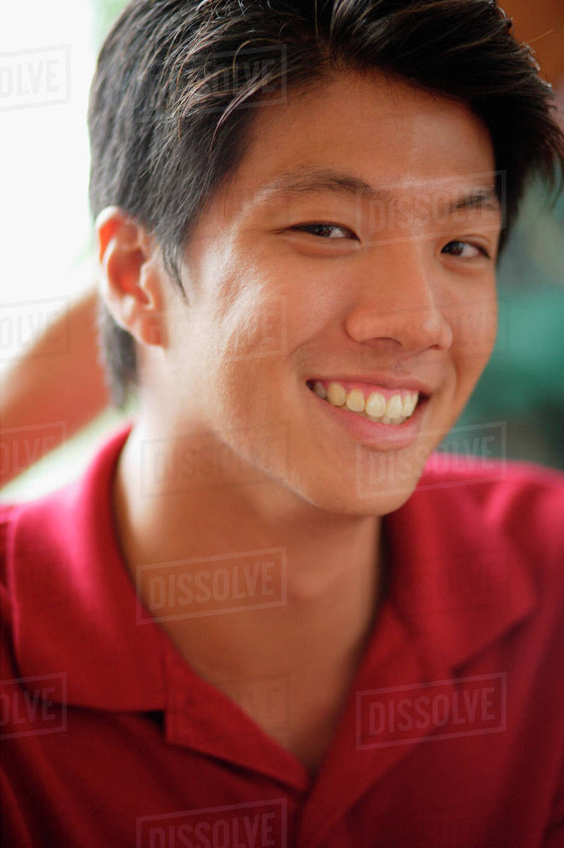 Man smiling at camera - Royalty-free Stock Photo | Dissolve