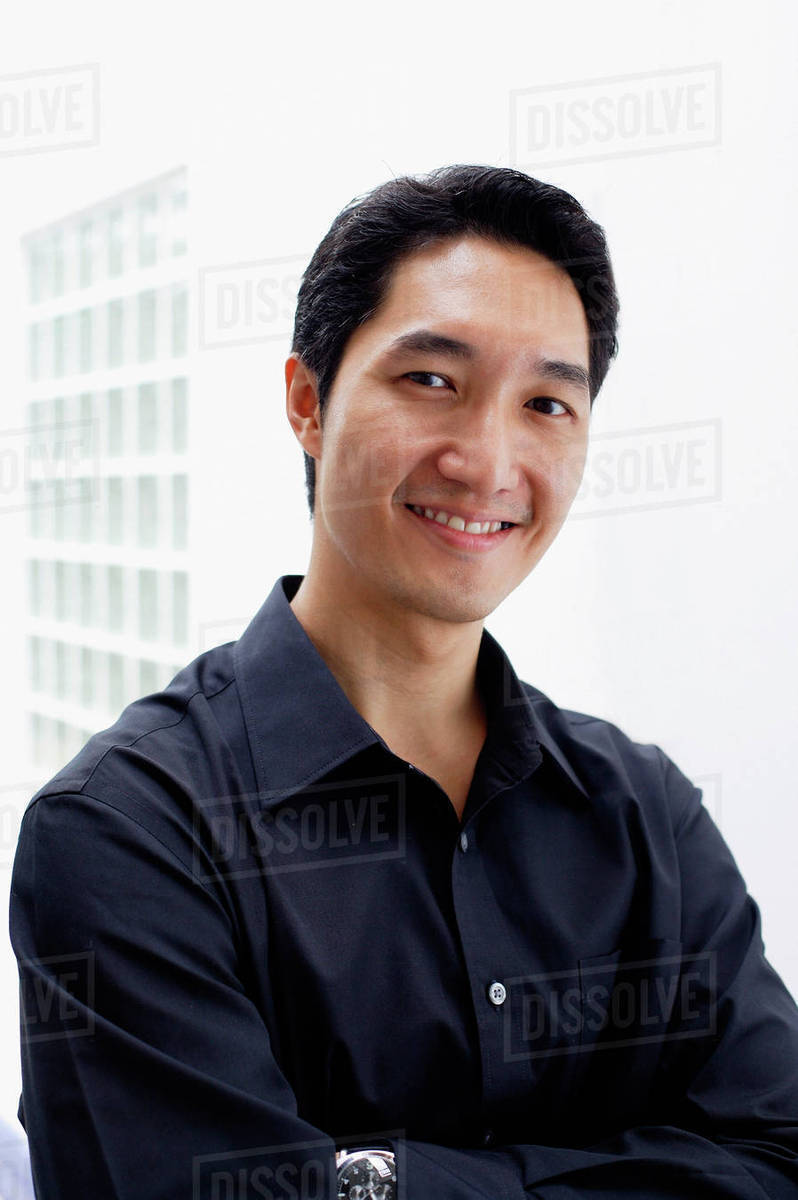 Man smiling at camera - Royalty-free Stock Photo | Dissolve