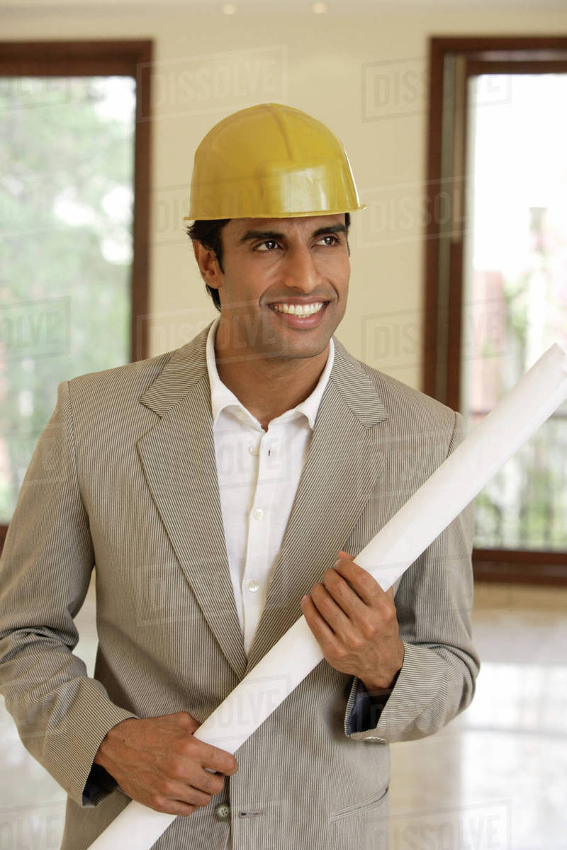 Portrait of contractor with blueprints - Royalty-free Stock Photo ...