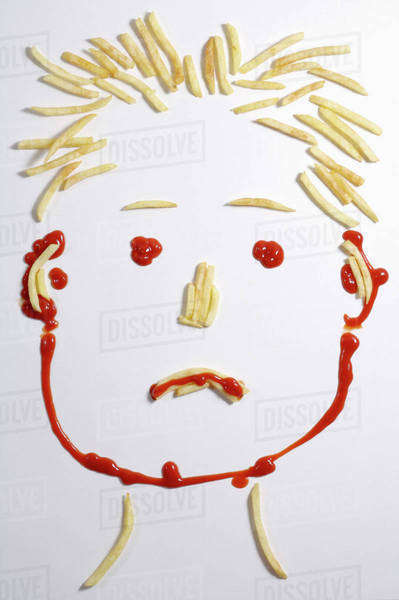 A sad face made from french fries and ketchup - Royalty-free Stock ...