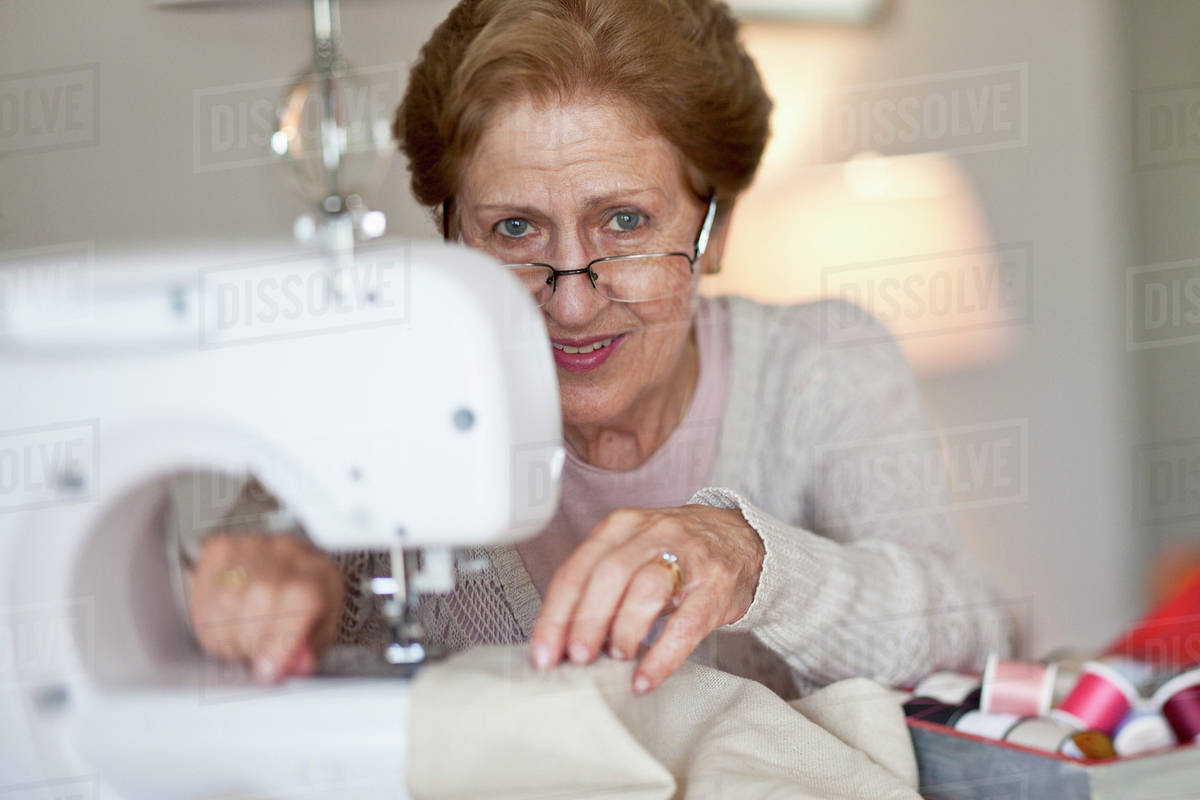 A senior woman sewing - Royalty-free Stock Photo | Dissolve