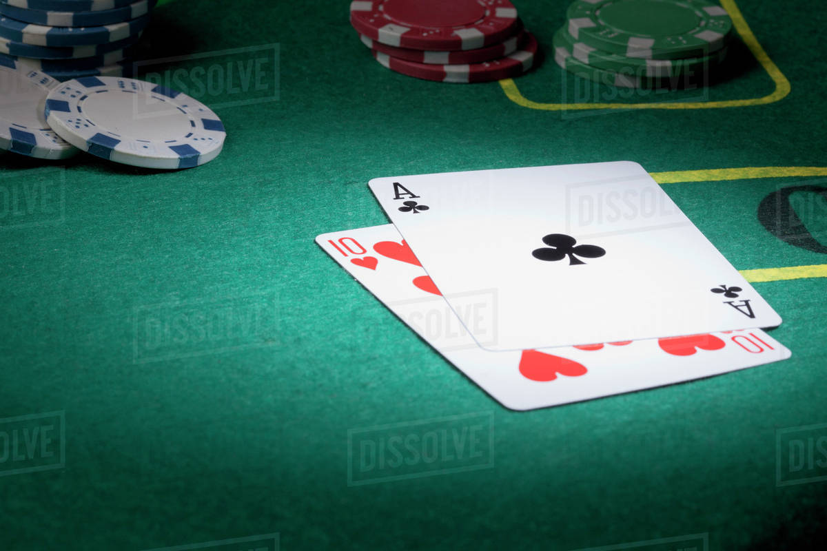 A blackjack hand displaying twenty-one - Stock Photo - Dissolve
