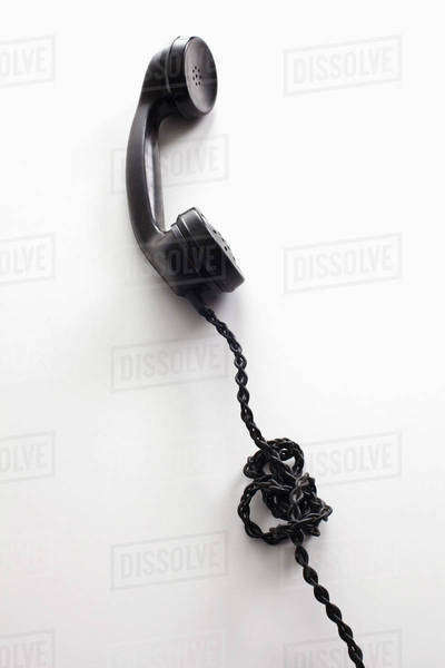 An old-fashioned telephone cord tangled in a knot - Royalty-free Stock ...