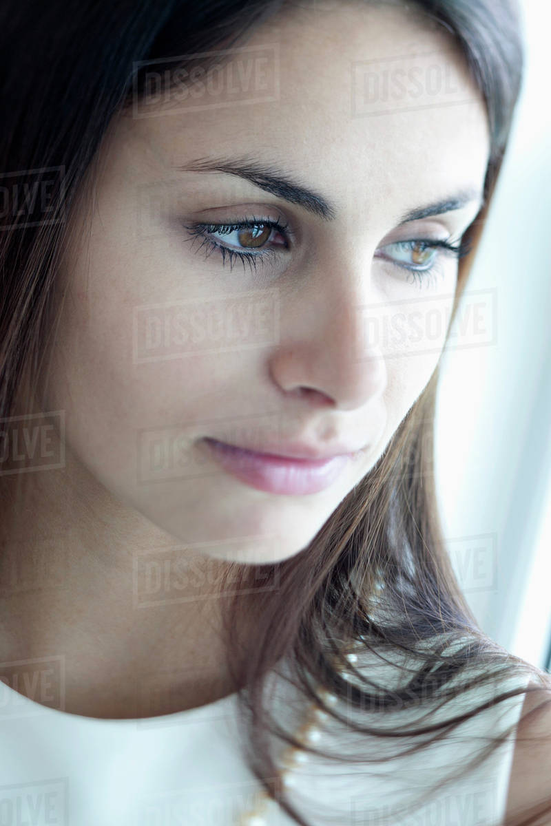 Pensive woman with reflection in her eyes - Royalty-free Stock Photo ...