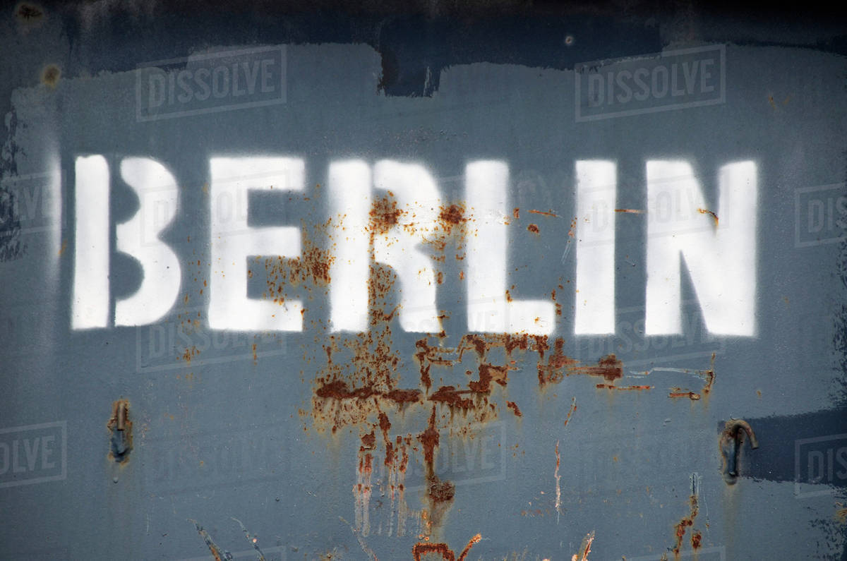 'Berlin' stencil on metal container - Stock Photo - Dissolve