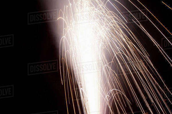 Sparks shooting from a firework - Royalty-free Stock Photo | Dissolve