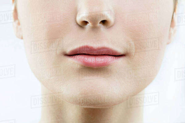 Shot of lower half of woman's head - Royalty-free Stock Photo | Dissolve