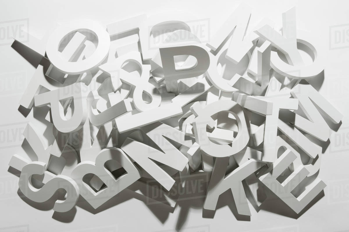 A pile of various white block letters from the alphabet - Stock Photo ...