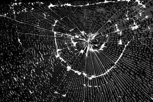 Close-up of broken glass - Stock Photo - Dissolve