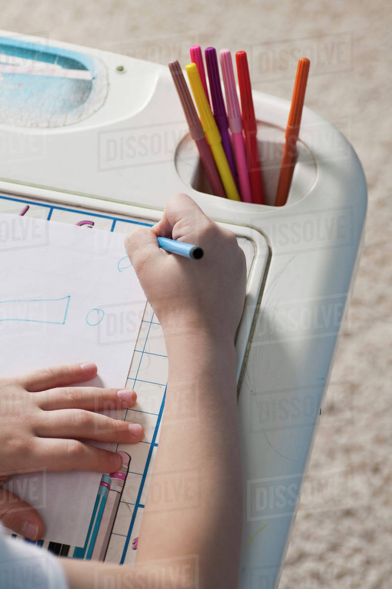 Child's hand drawing on paper, close-up - Royalty-free Stock Photo ...