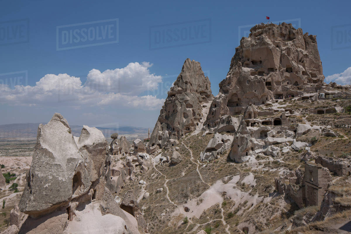Rock formations against blue sky - Royalty-free Stock Photo | Dissolve