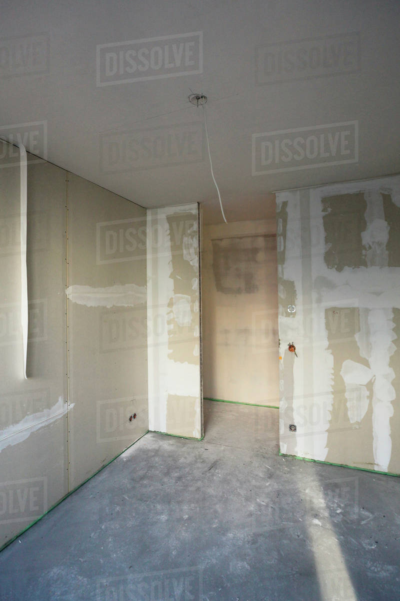 Interior of house under renovation - Stock Photo - Dissolve
