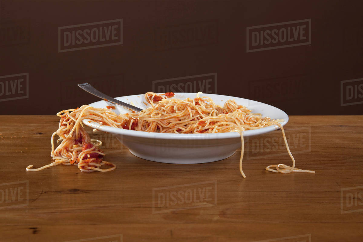 A messy plate of spaghetti, studio shot - Royalty-free Stock Photo ...