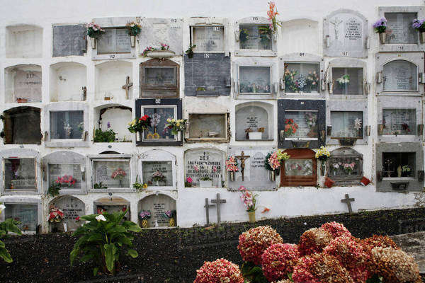 Stacked tombs in a cemetery - Stock Photo - Dissolve