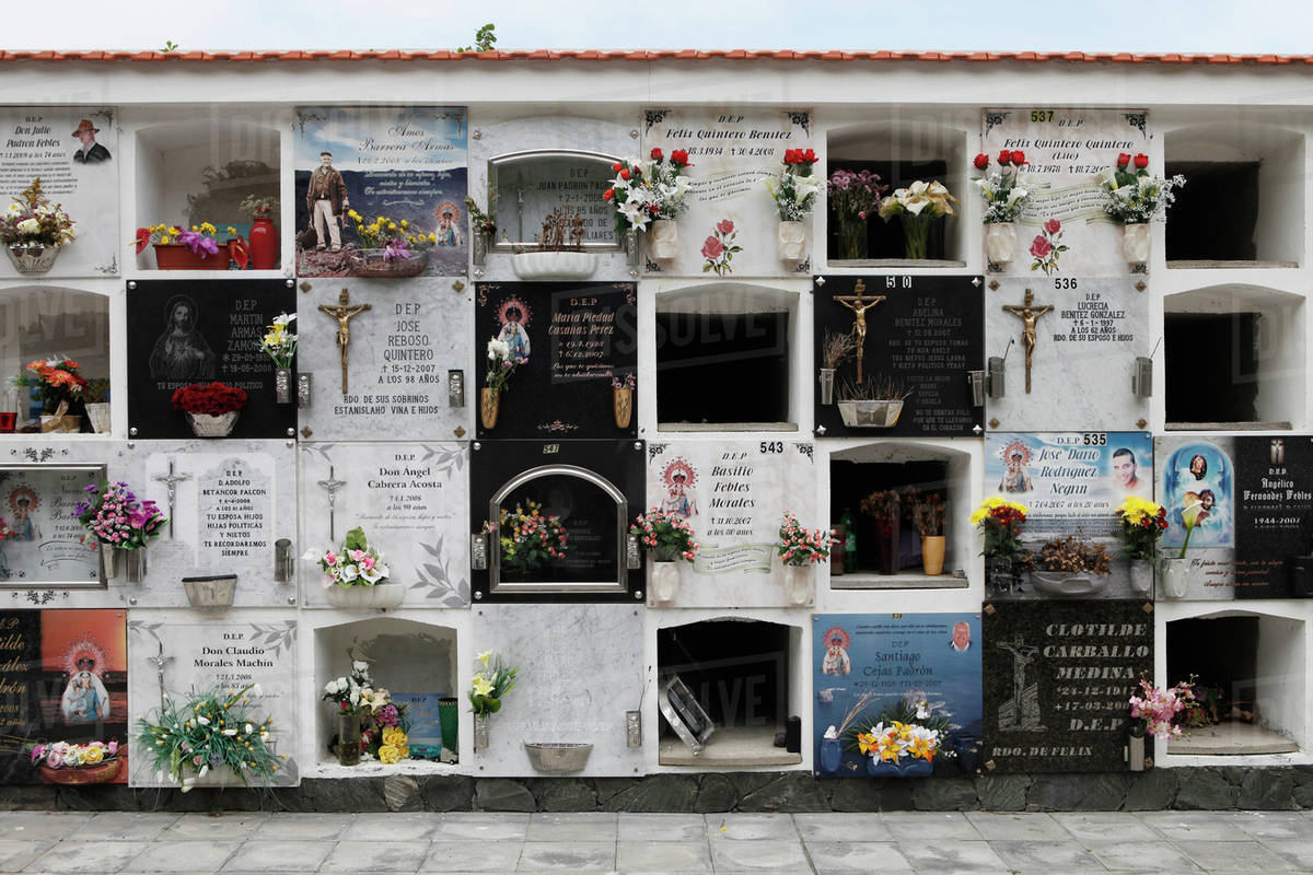 Stacked tombs in a cemetery - Royalty-free Stock Photo | Dissolve