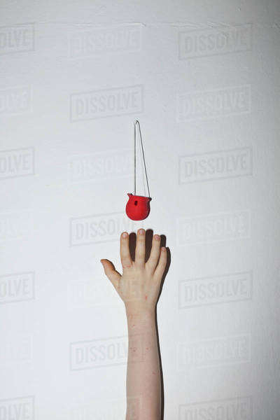 A hand reaching up a wall for a clown's nose - Royalty-free Stock Photo ...