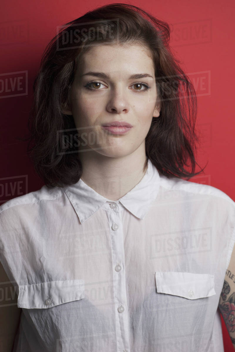 Young woman looking at camera, close-up - Royalty-free Stock Photo ...