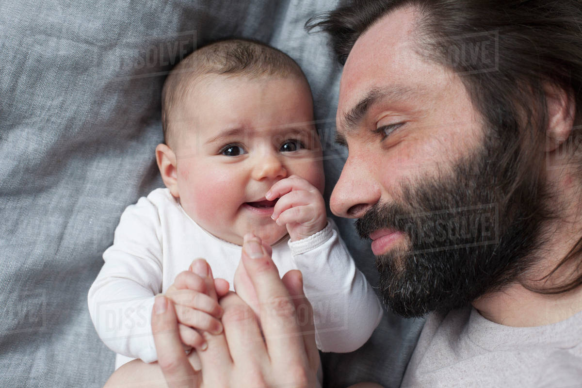 High angle view of affectionate father and baby girl - Royalty-free ...