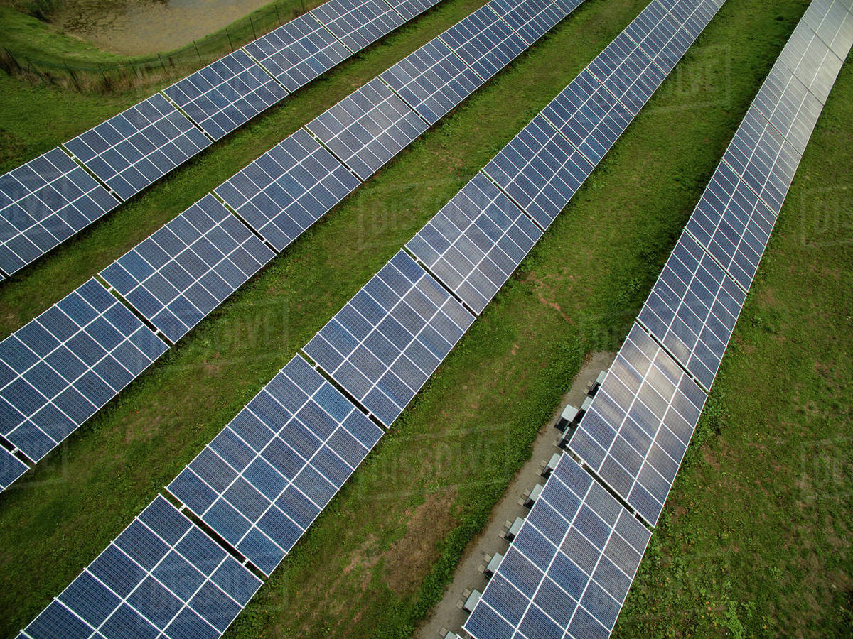 Solar panels on field - Royalty-free Stock Photo | Dissolve