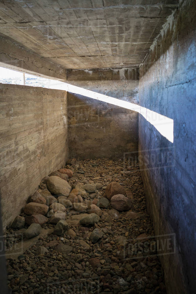 Sunlight emitting through window in abandoned bunker - Stock Photo ...