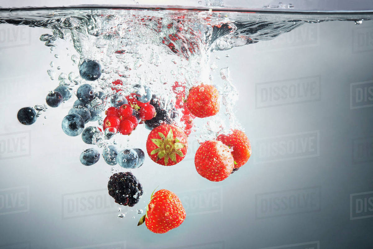 Close-up of various berries in splashing water - Royalty-free Stock ...
