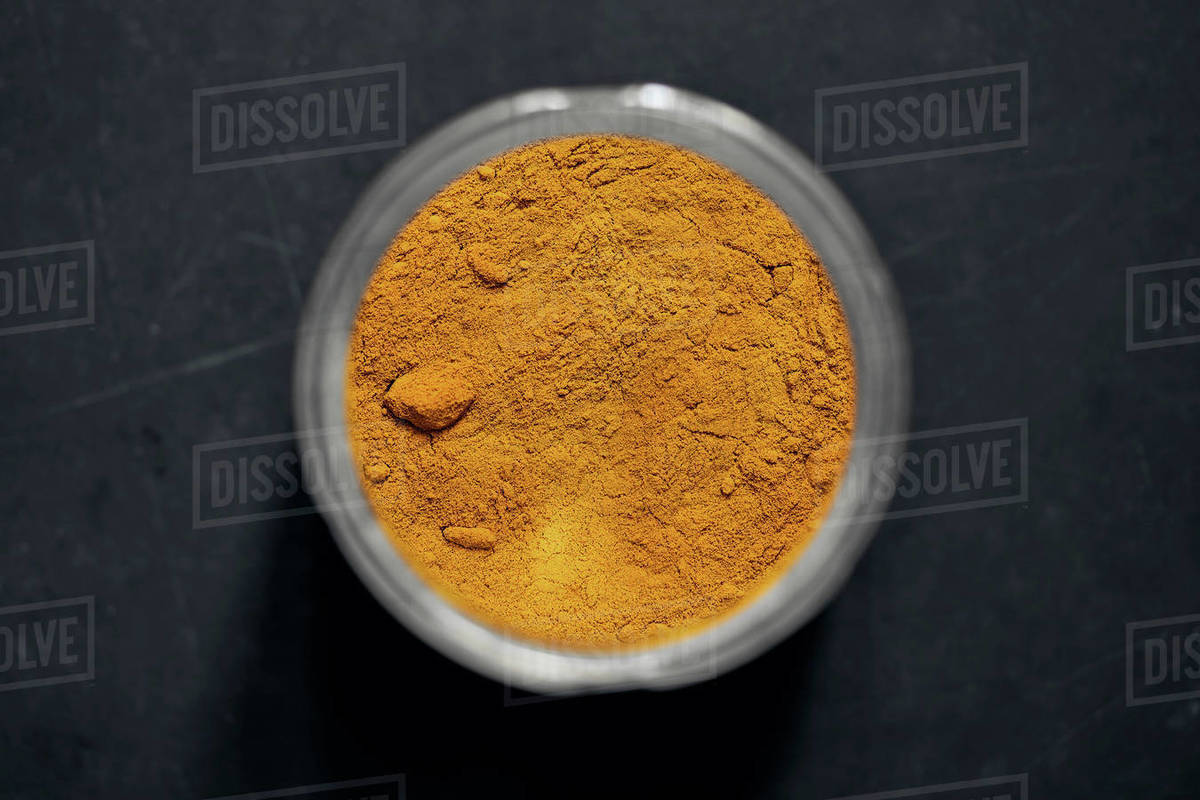 View from above turmeric powder in spice jar - Royalty-free Stock Photo ...