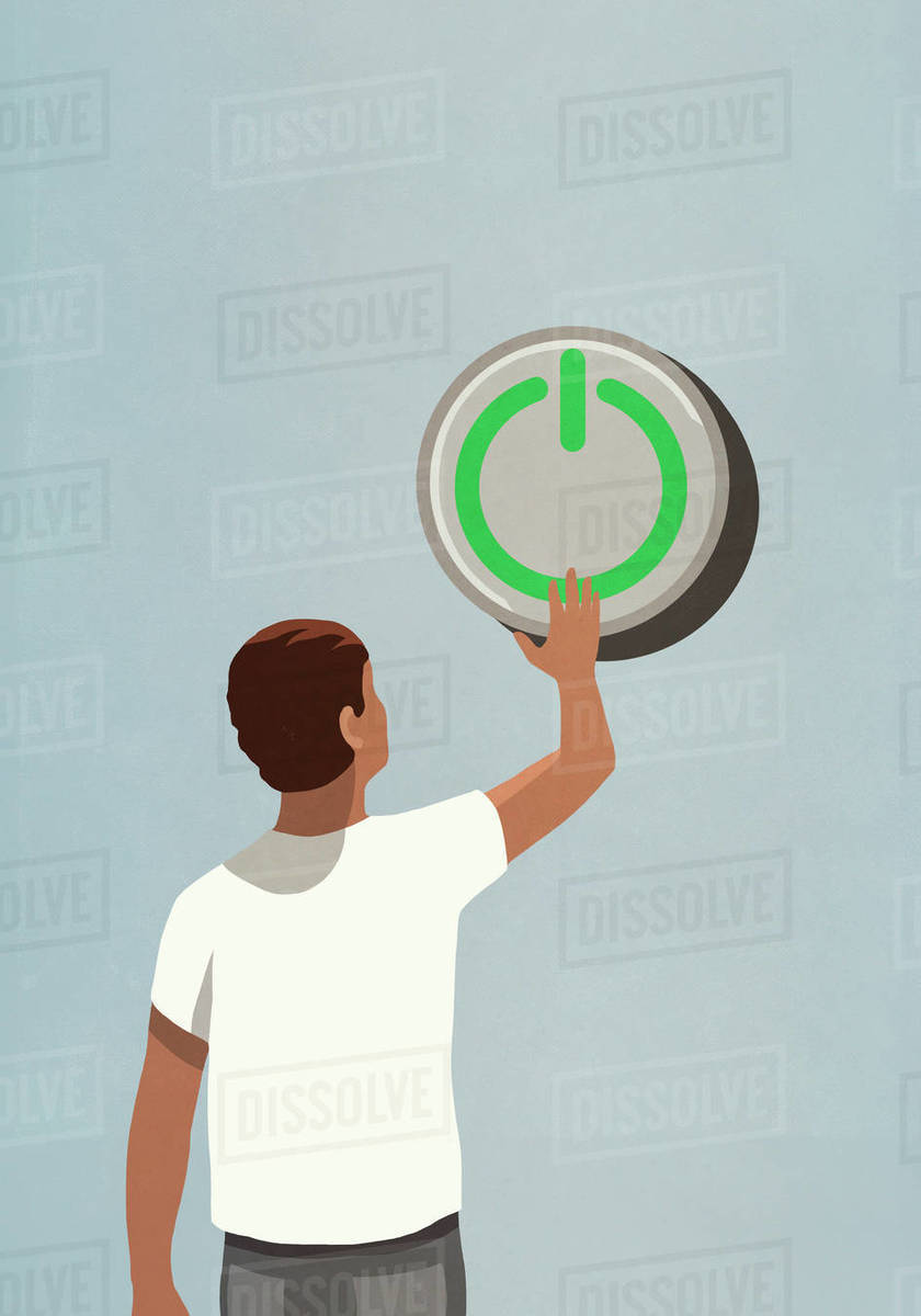 Man pushing large power on button - Royalty-free Stock Photo | Dissolve