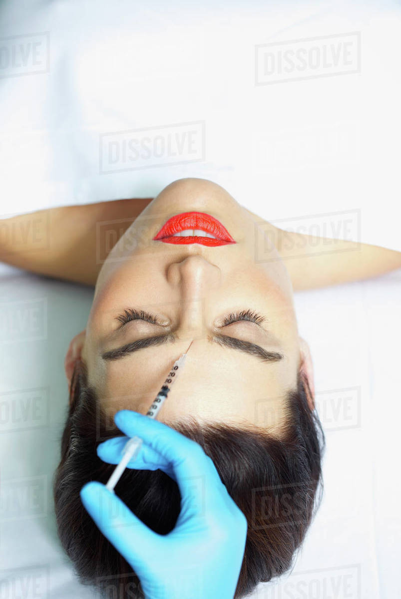 Woman Receiving Botox Injection on Forehead - Royalty-free Stock Photo ...