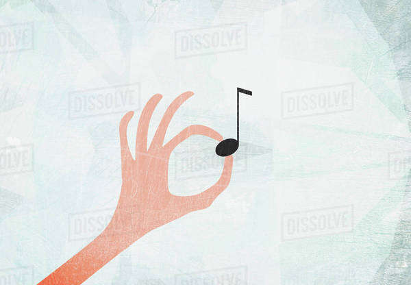 A hand holding a musical note - Stock Photo - Dissolve